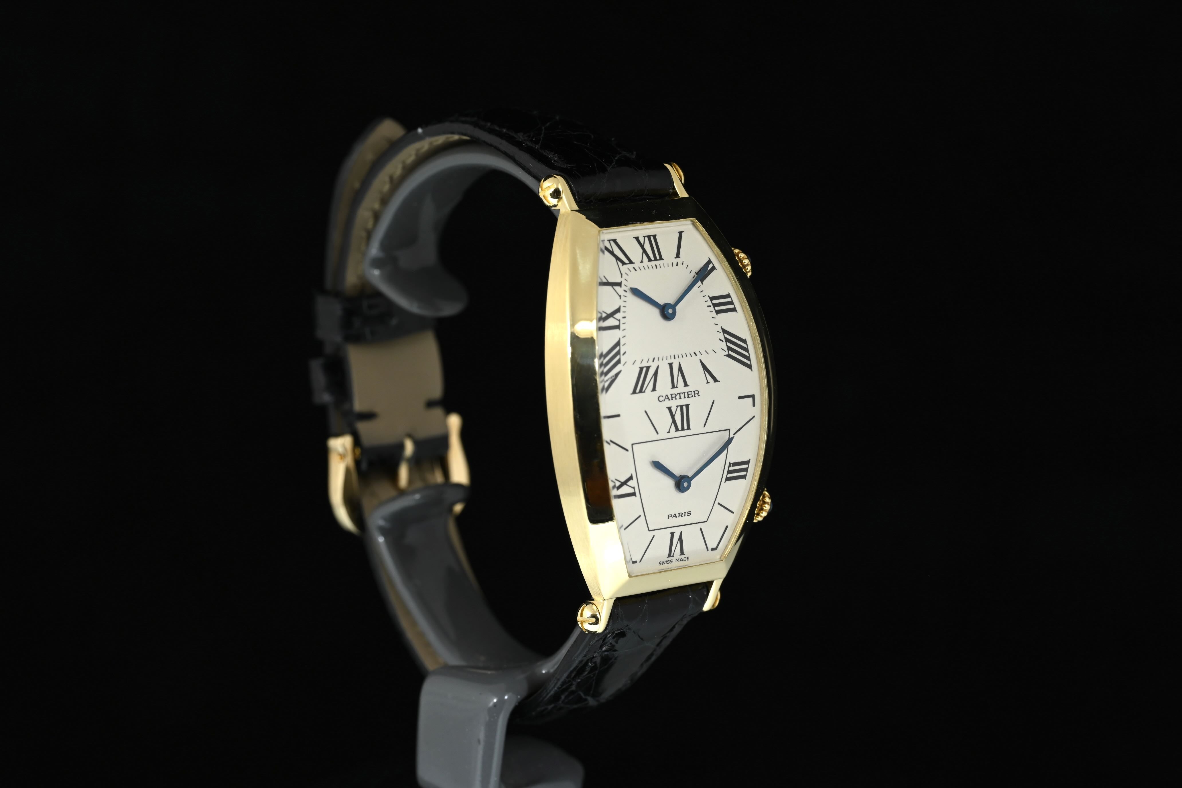 CARTIER | Dual Time tonneau quartz watch in 18K yellow gold. Cartier b ...